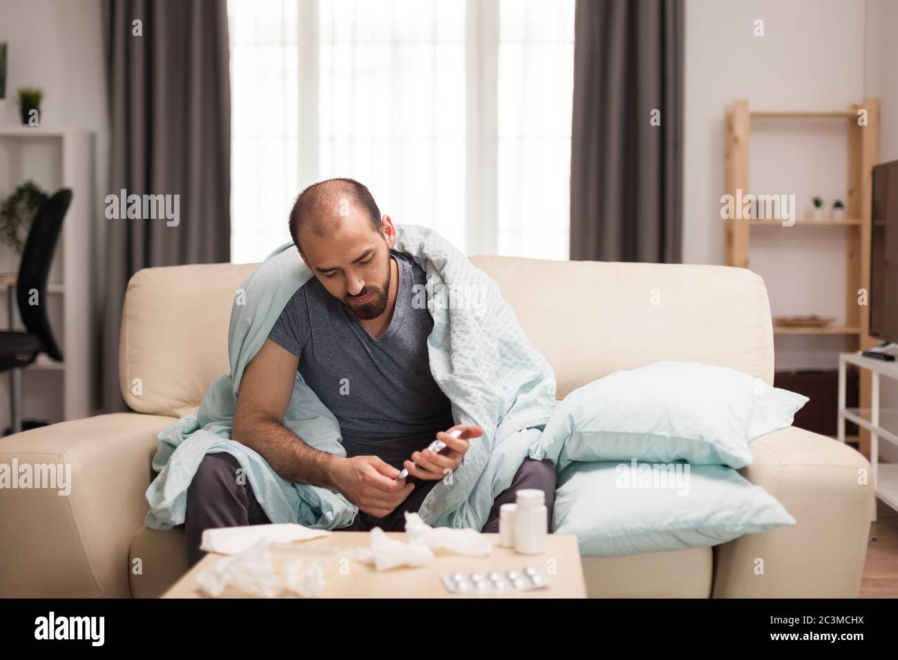 Sick man fever during hi-res stock photography and images - Alamy