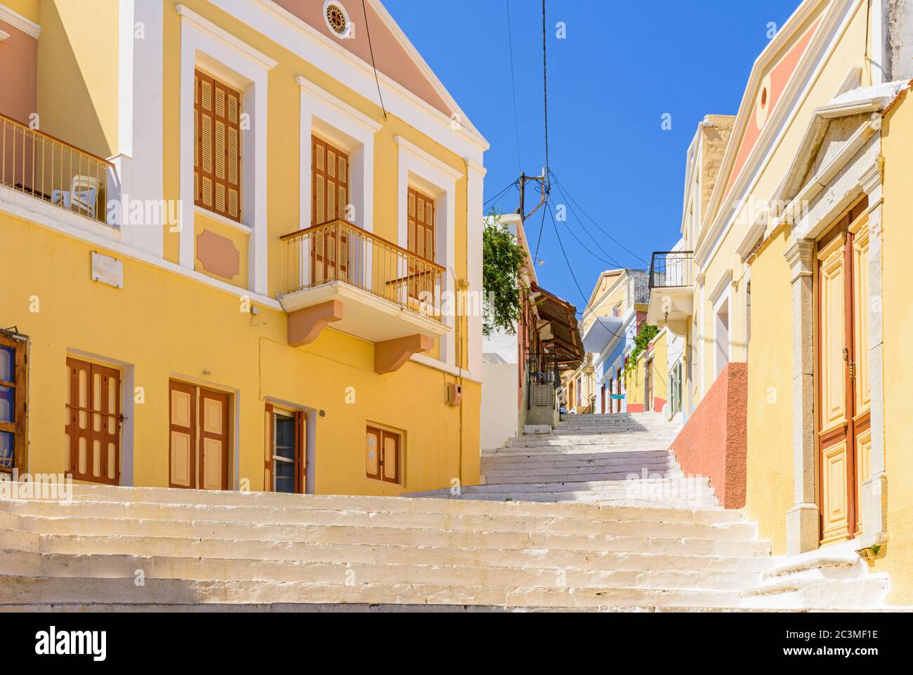 Colourful houses in the old hillside Horio, Symi Island, Dodecanese ...