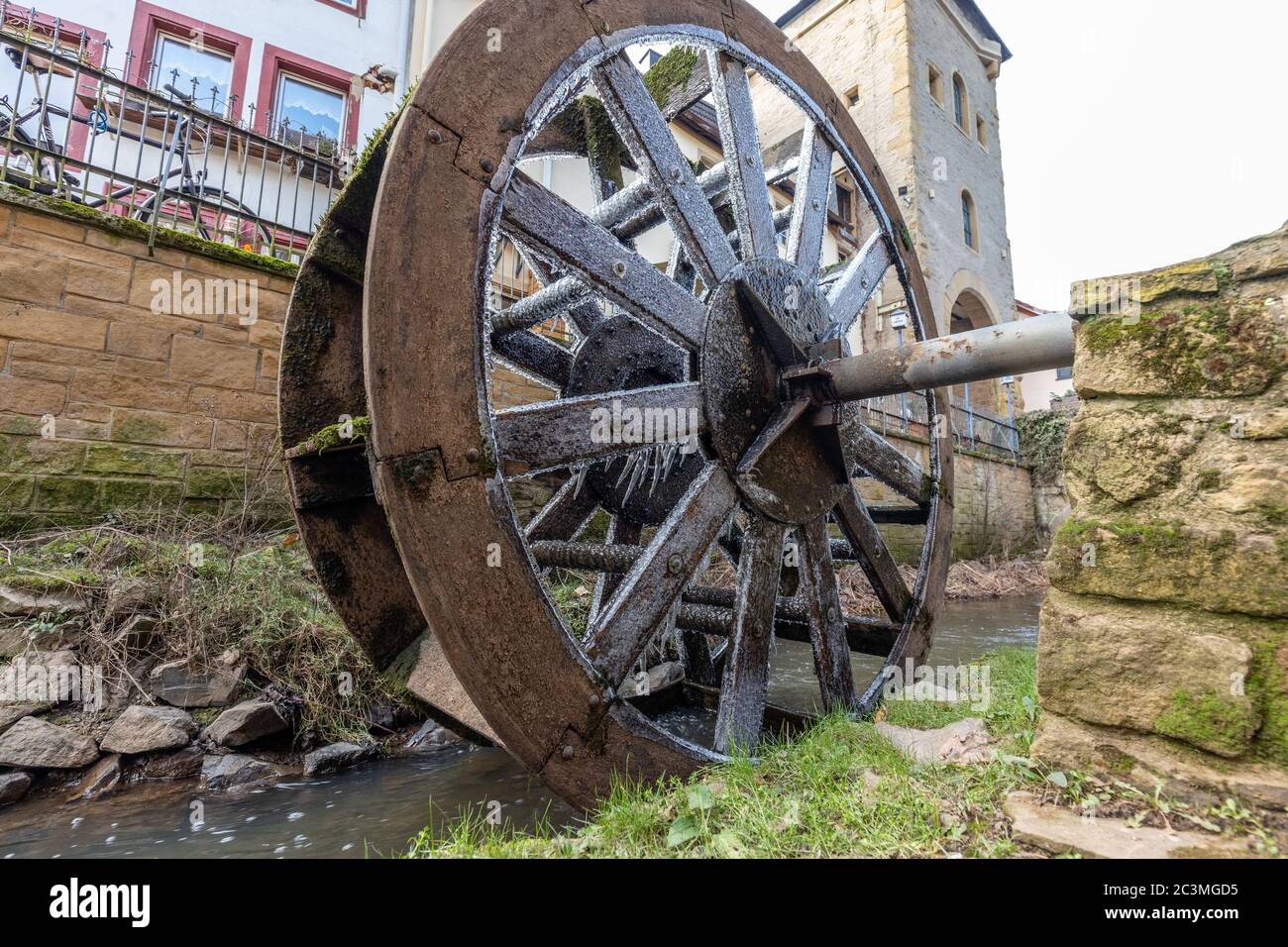 Water wheel in winter with icicles in Meisenheim, Germany Stock Photo ...
