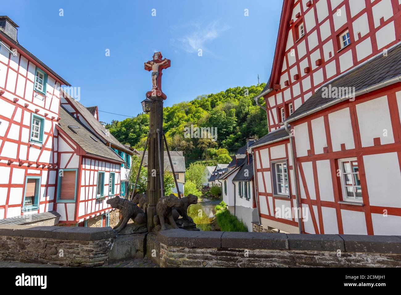 View from an old bridge on River elz and half-timbered houses in ...