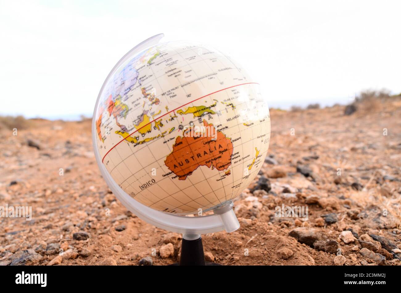 Globe Planet Earth in the Rock Desert Stock Photo - Alamy