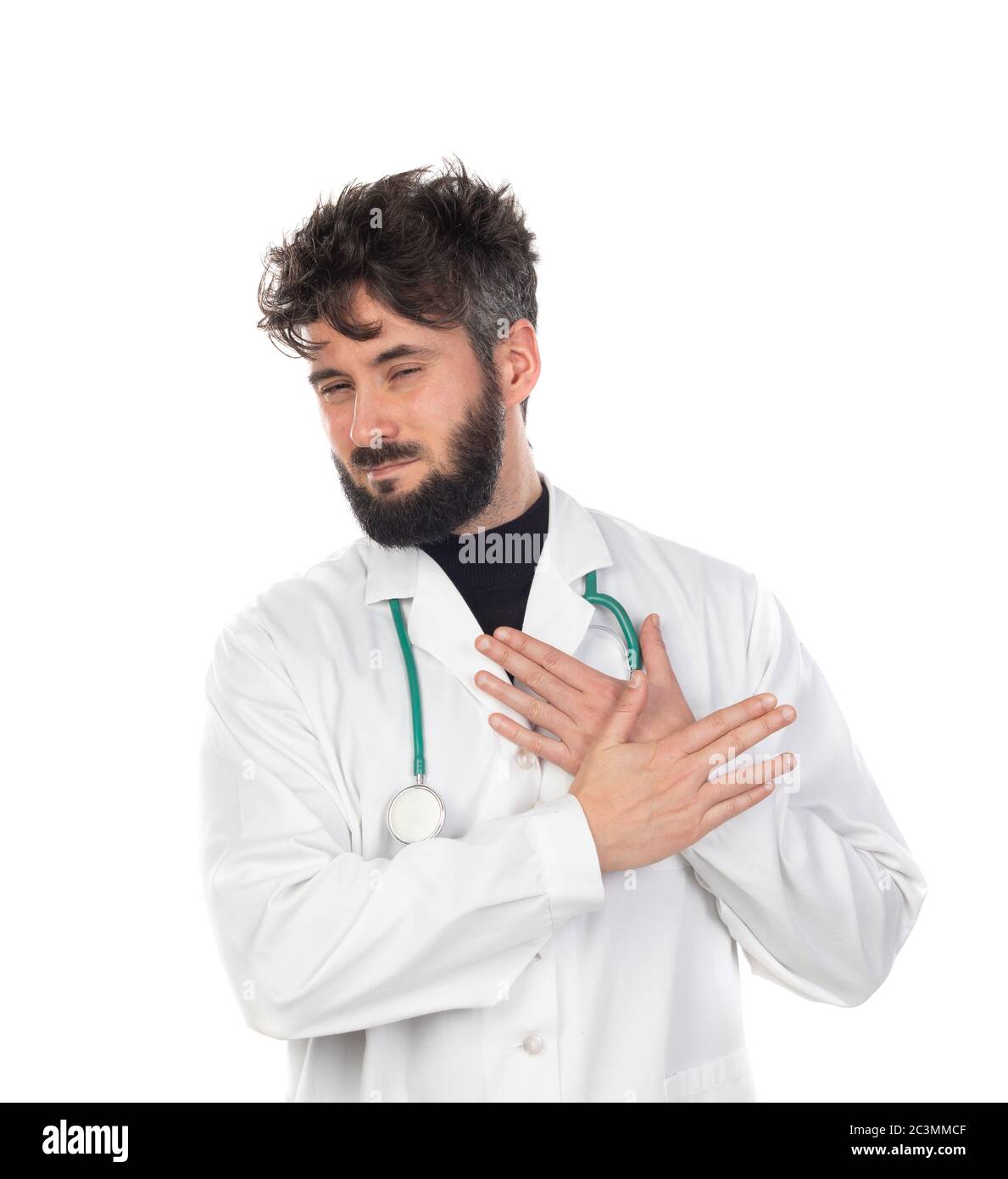 Young doctor with beard wearing a medical gown isolated on a white ...