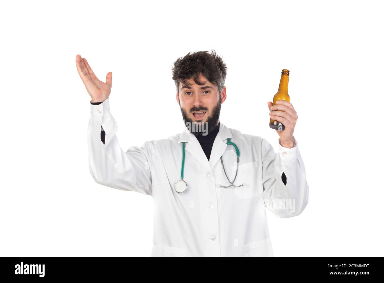 Young doctor with beard wearing a medical gown isolated on a white ...