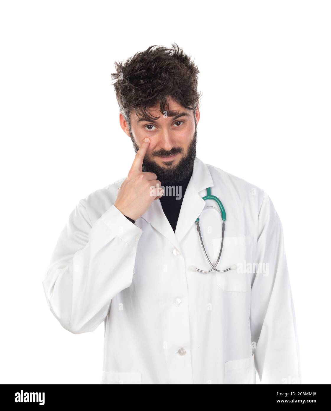 Young doctor with beard wearing a medical gown isolated on a white ...