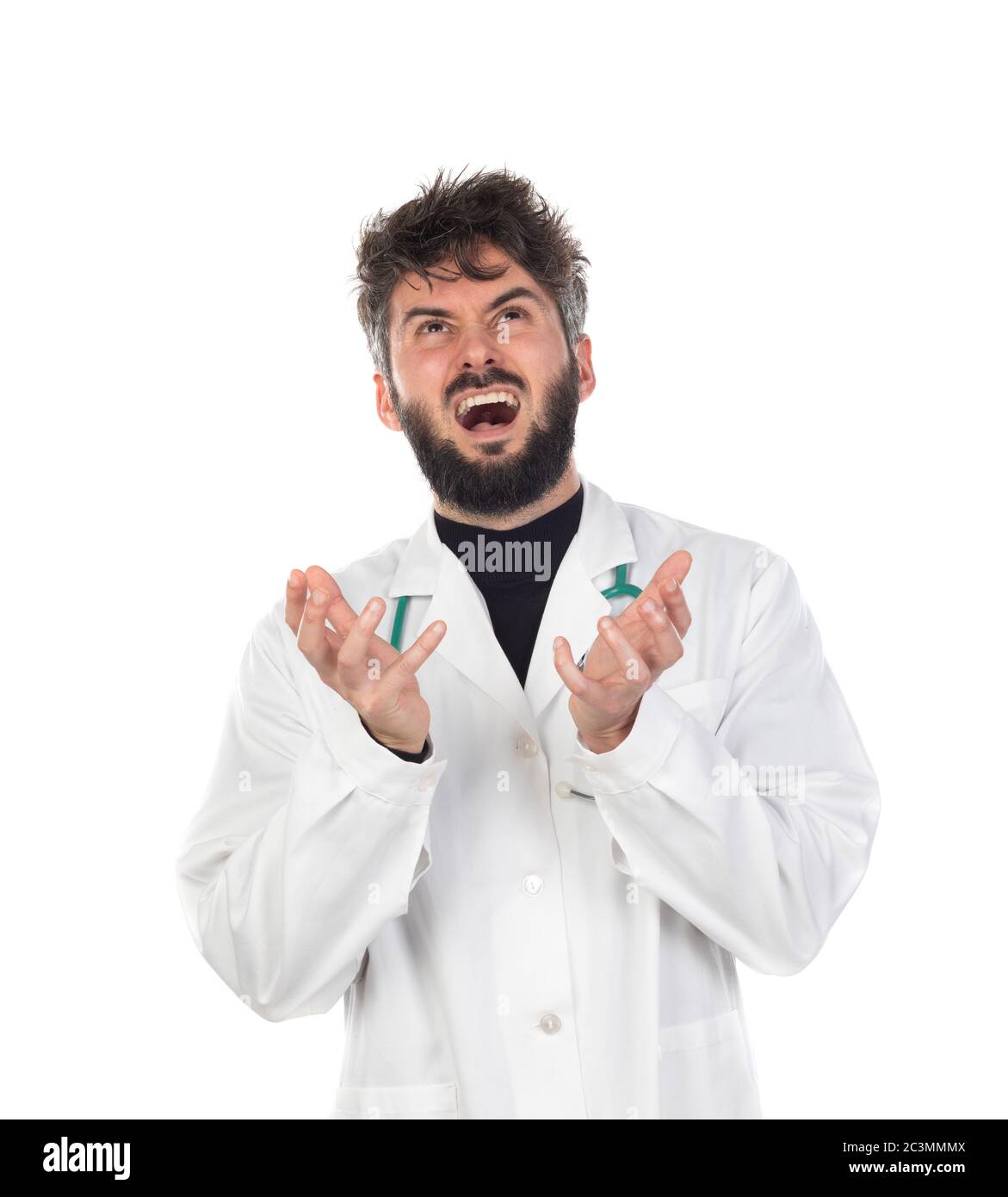 Young doctor with beard wearing a medical gown isolated on a white ...