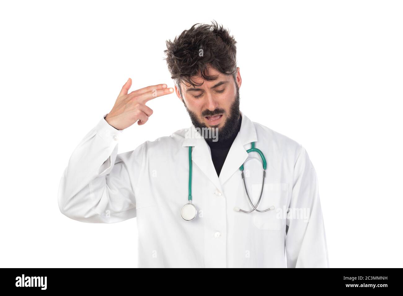Young doctor with beard wearing a medical gown isolated on a white ...