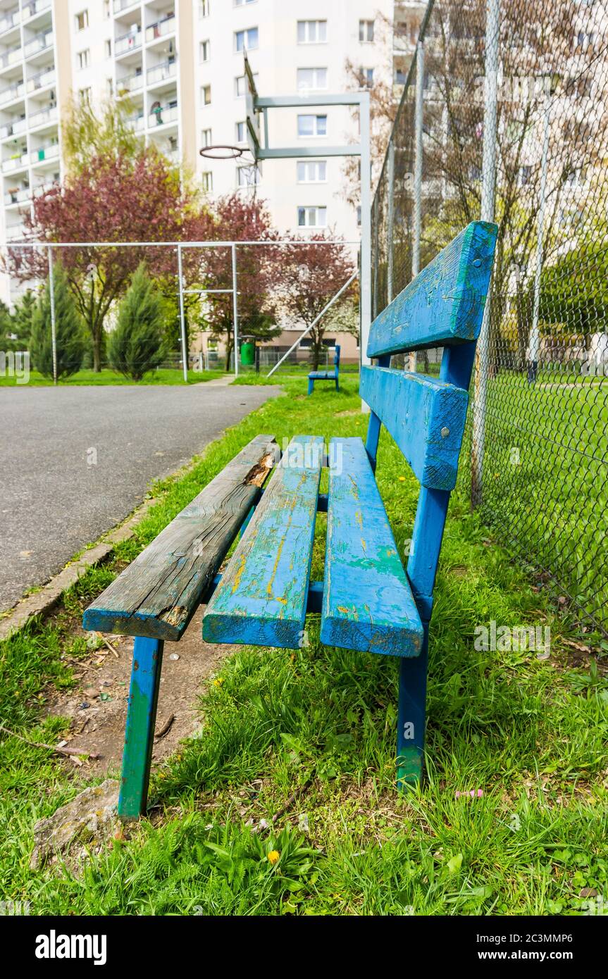 Vertical shot of a blue bench in the park Stock Photo - Alamy