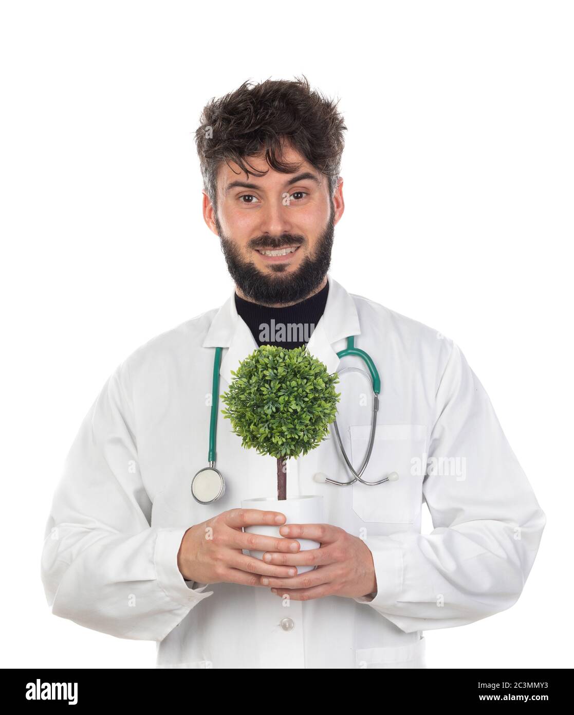 Young doctor with beard wearing a medical gown isolated on a white ...