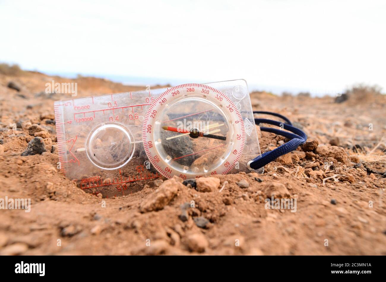 Orientation Concept Metal Compass on a Rock in the Desert Stock Photo ...