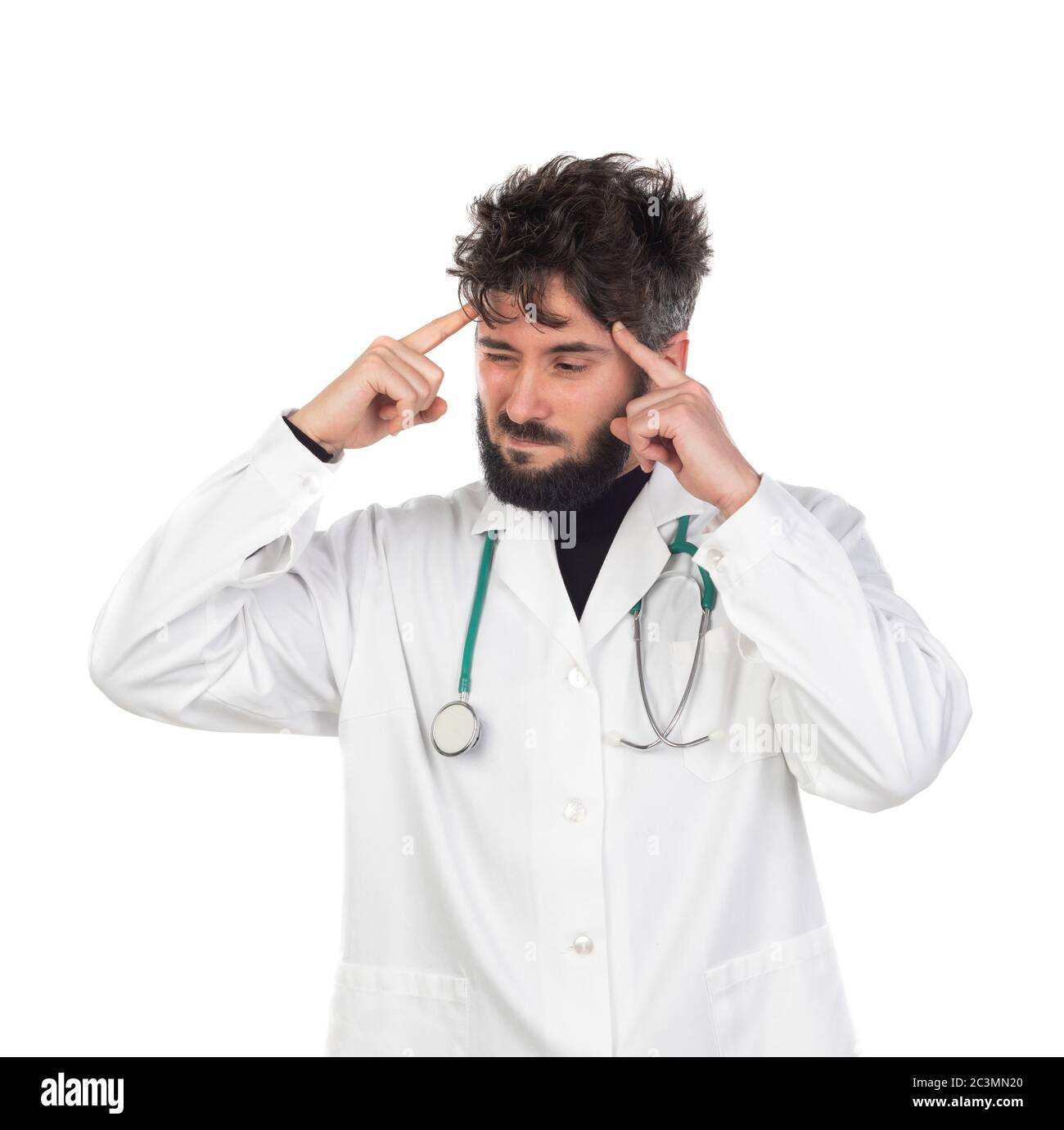 Young doctor with beard wearing a medical gown isolated on a white ...
