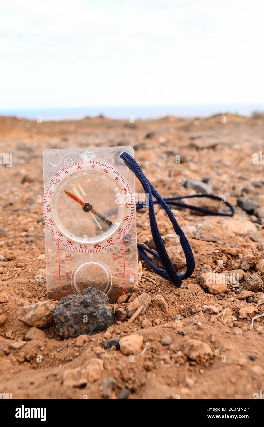 Orientation Concept Metal Compass on a Rock in the Desert Stock Photo ...