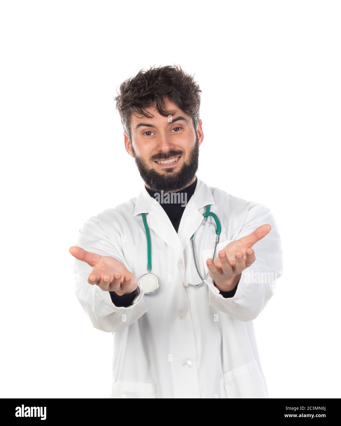 Young doctor with beard wearing a medical gown isolated on a white ...