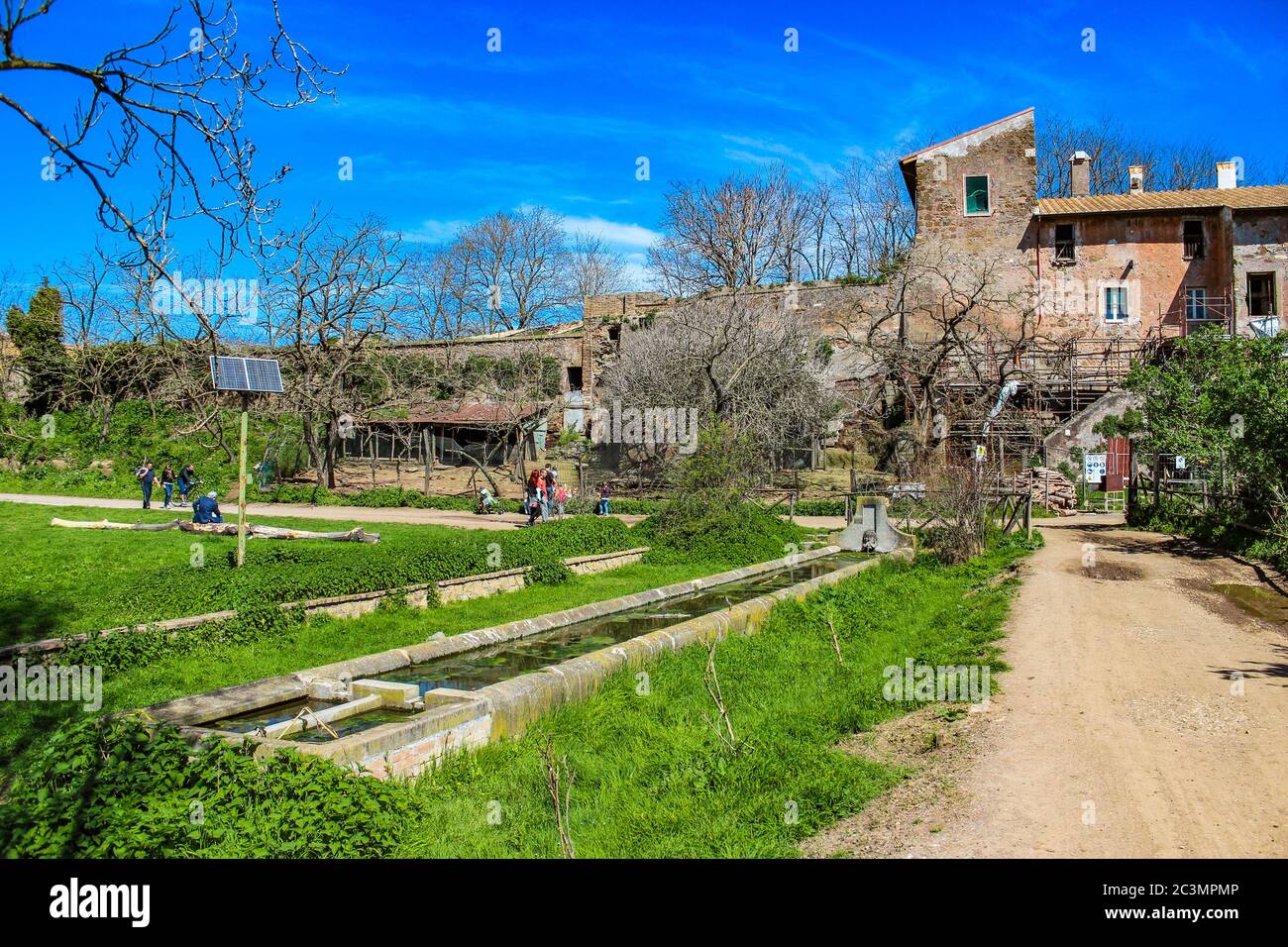 a farm with a watering hole for animals, inside the Caffarella park ...