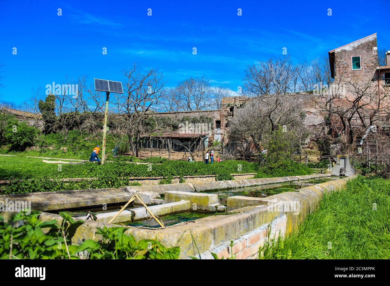 a farm with a watering hole for animals, inside the Caffarella park ...
