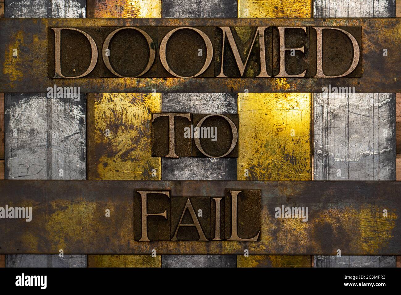 Doomed to Fail text formed with real authentic typeset letters on ...