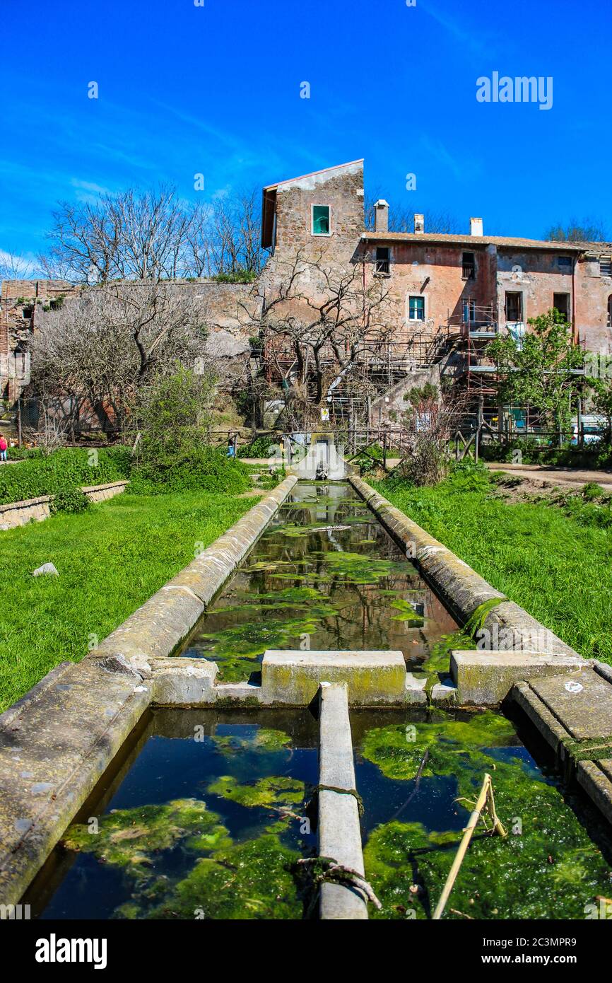 a farm with a watering hole for animals, inside the Caffarella park ...