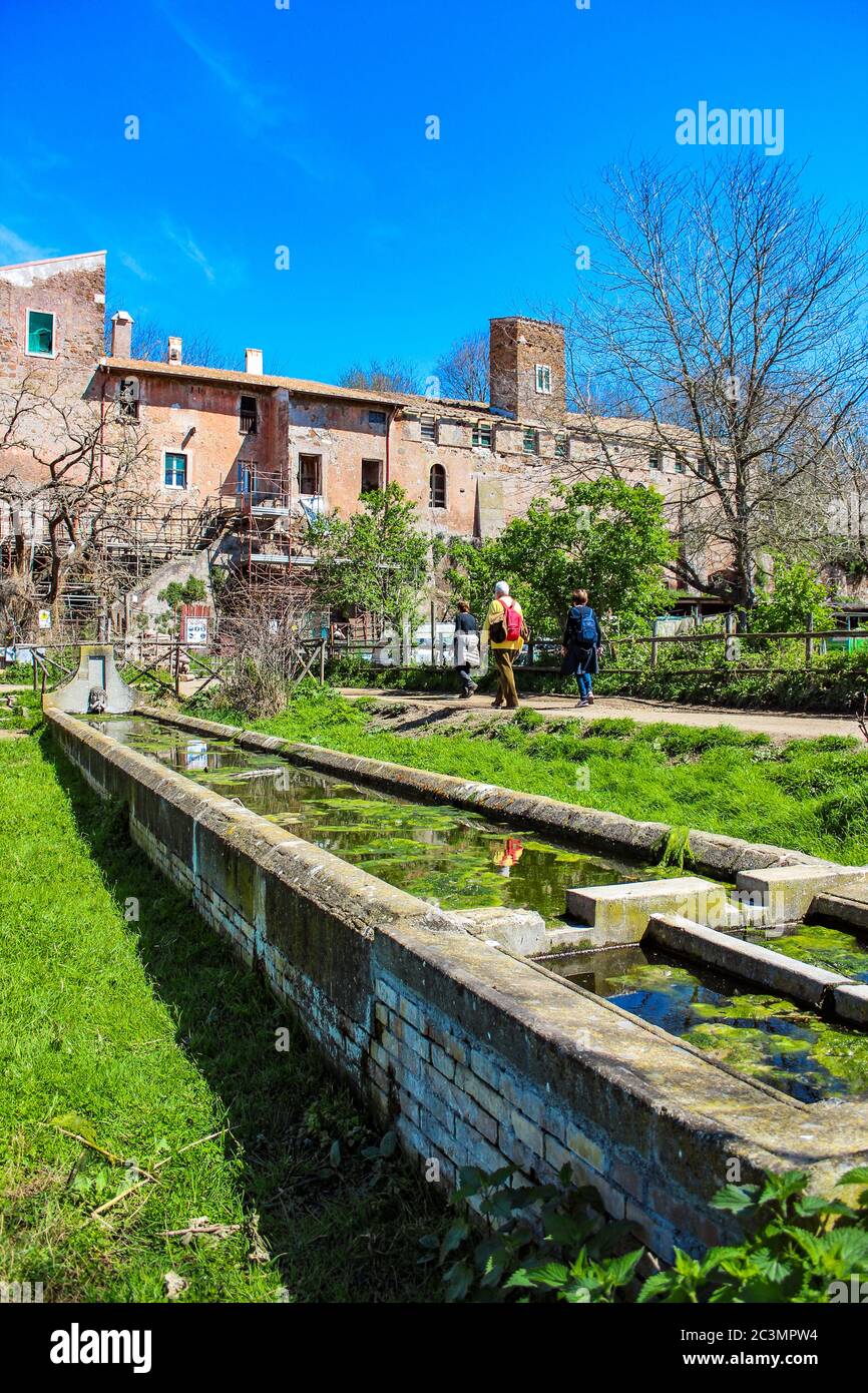 a farm with a watering hole for animals, inside the Caffarella park ...
