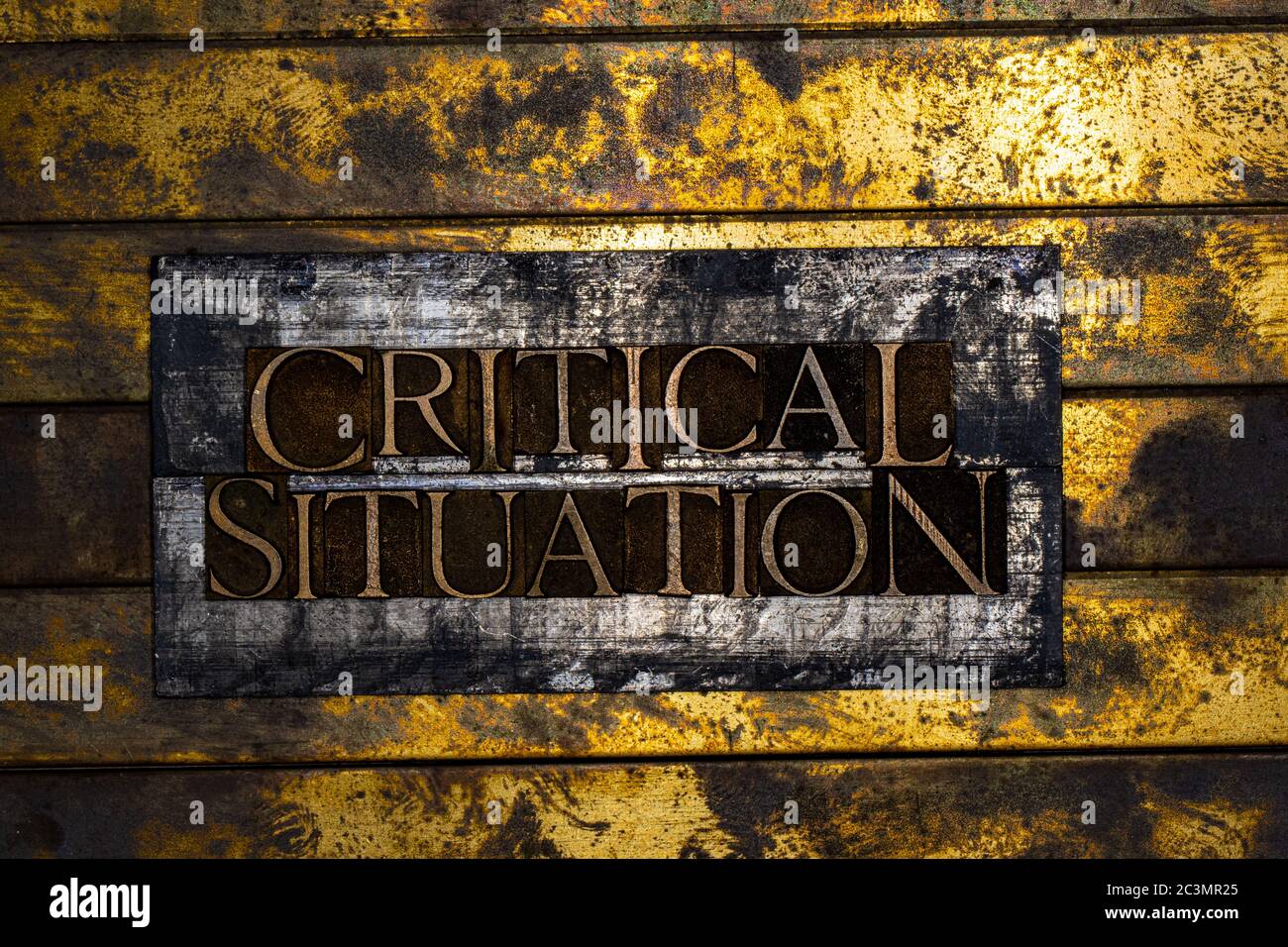 Critical Situation text formed with real authentic typeset letters on ...