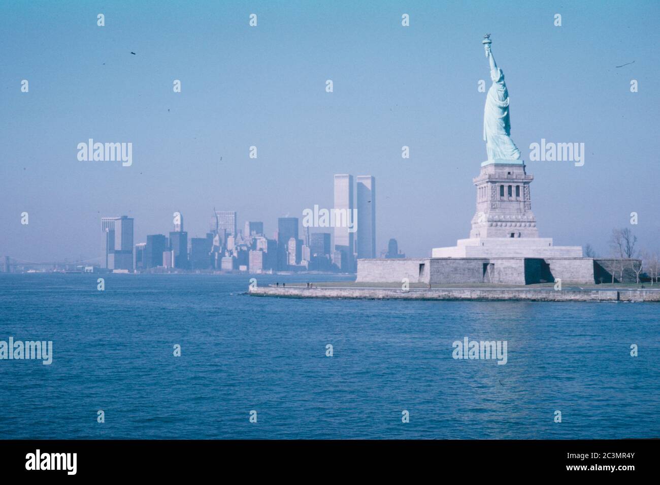 Beautiful shot of the Statue of Liberty from a boat in the ocean- great ...
