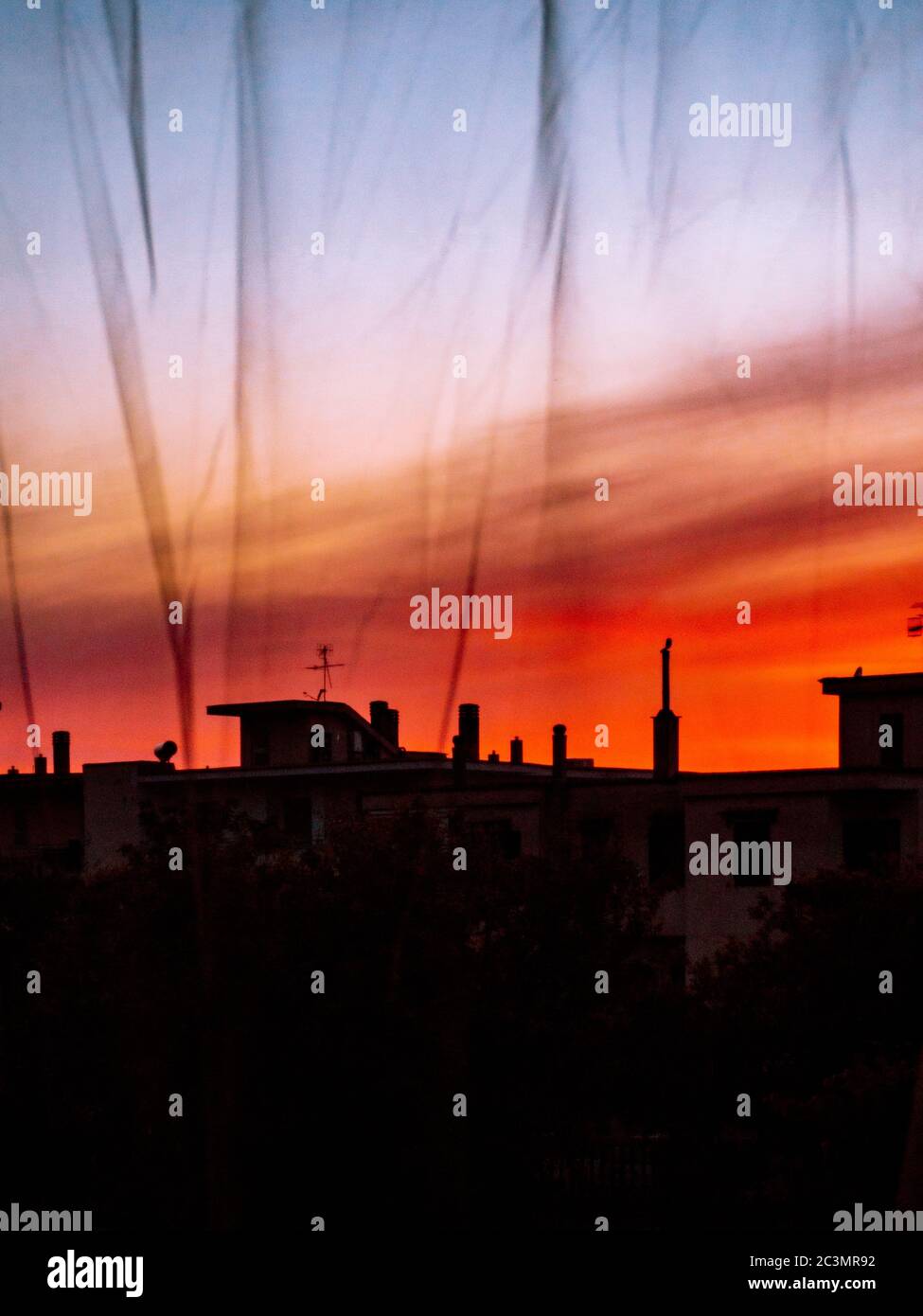 Mesmerizing and beautiful view of the sunset on the buildings - perfect ...