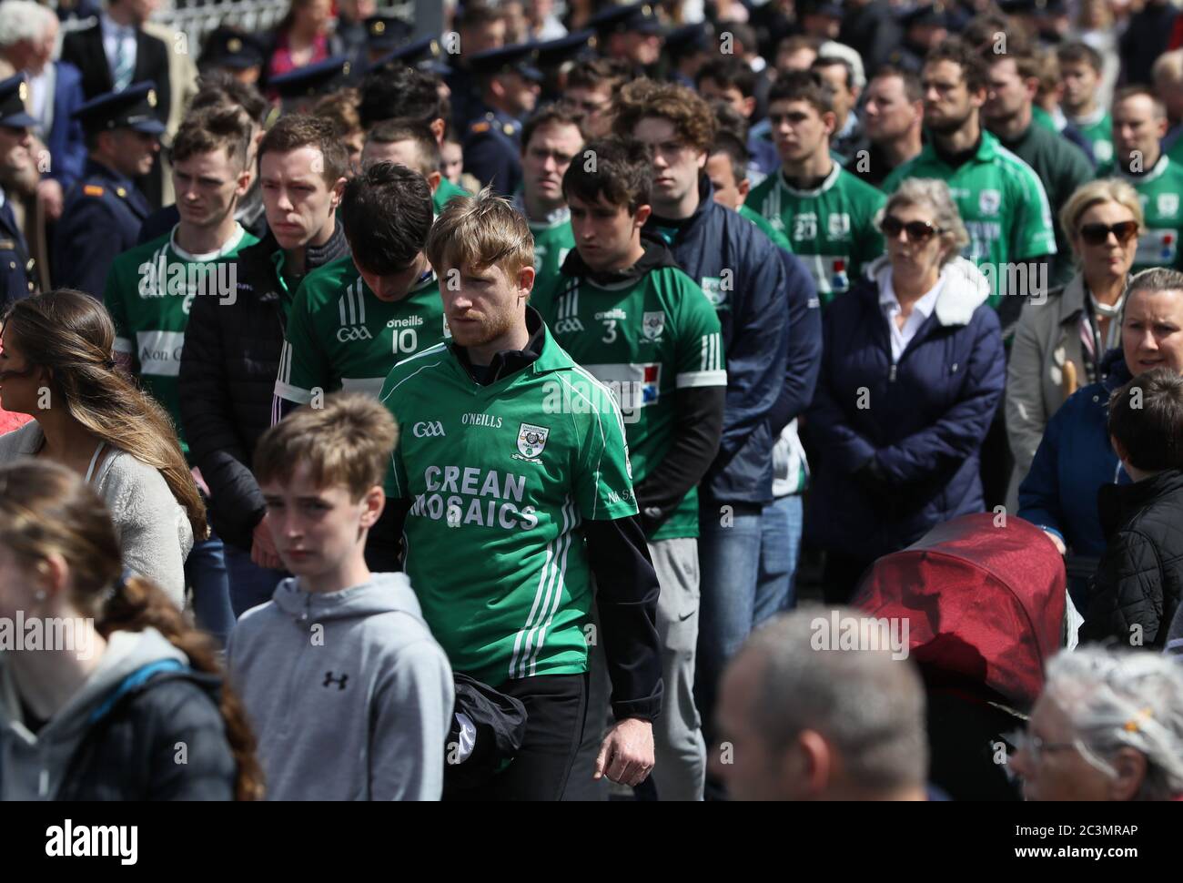 Members of Charlestown GAA club walk behind the coffin of Detective ...