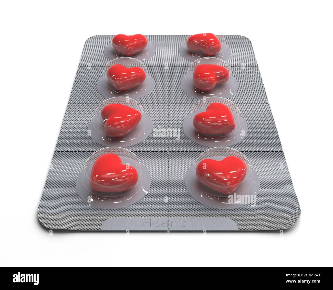Red pills in the shape of a heart in a blister. Pill packaging on a ...