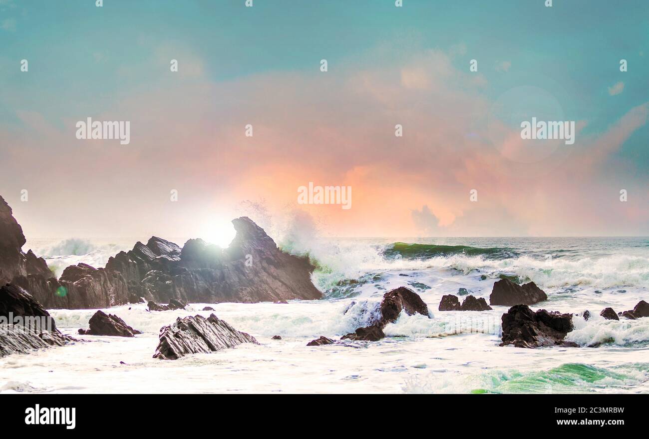 Waves hitting beach sunset shot hi-res stock photography and images - Alamy
