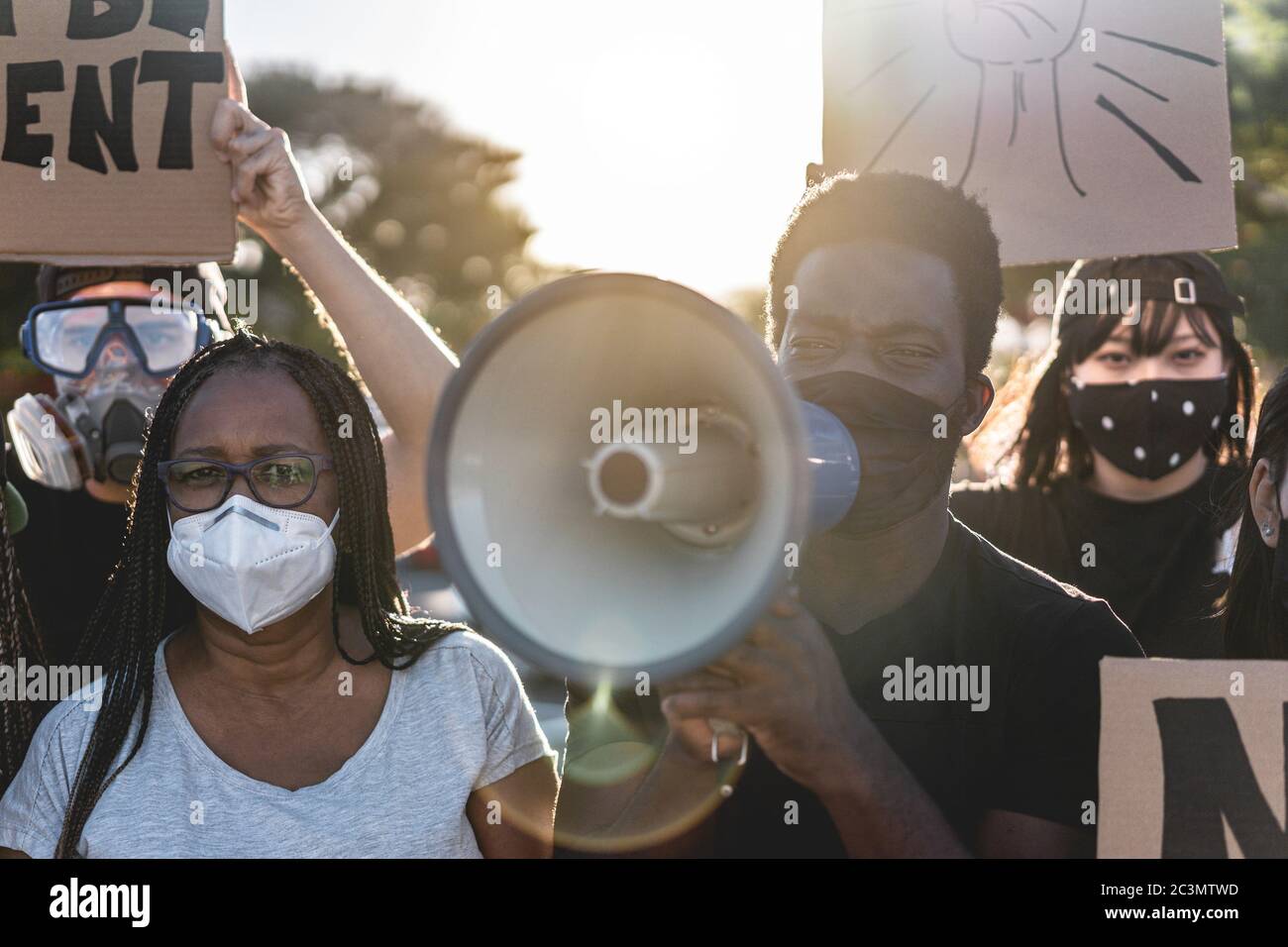 People from different culture and races protest on the street for equal ...
