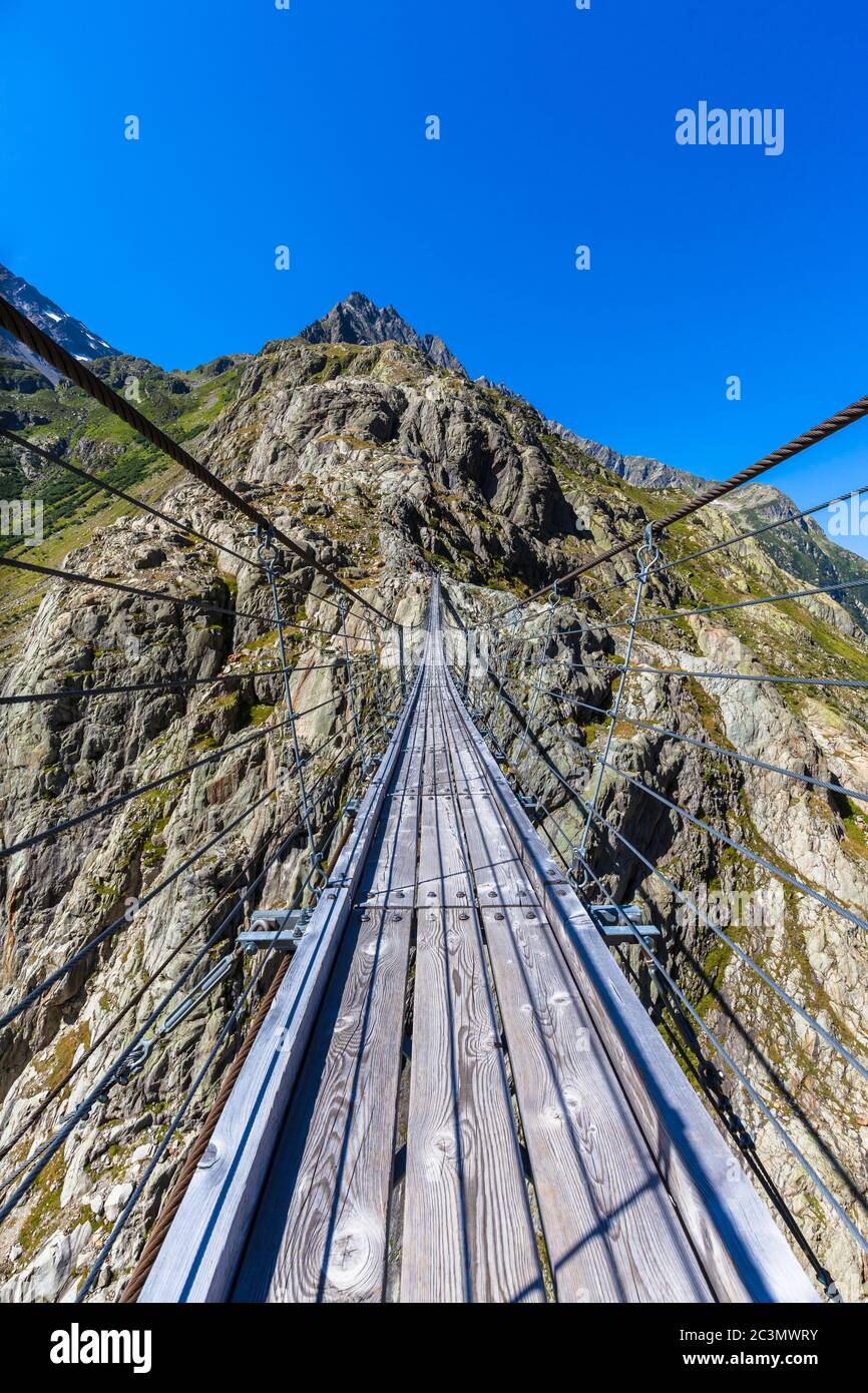 Stunning view on the Trift bridge, a suspension bridge over the ...
