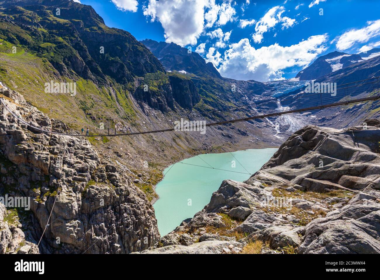 Stunning view of the suspension bridge, Trift bridge over the Trift ...