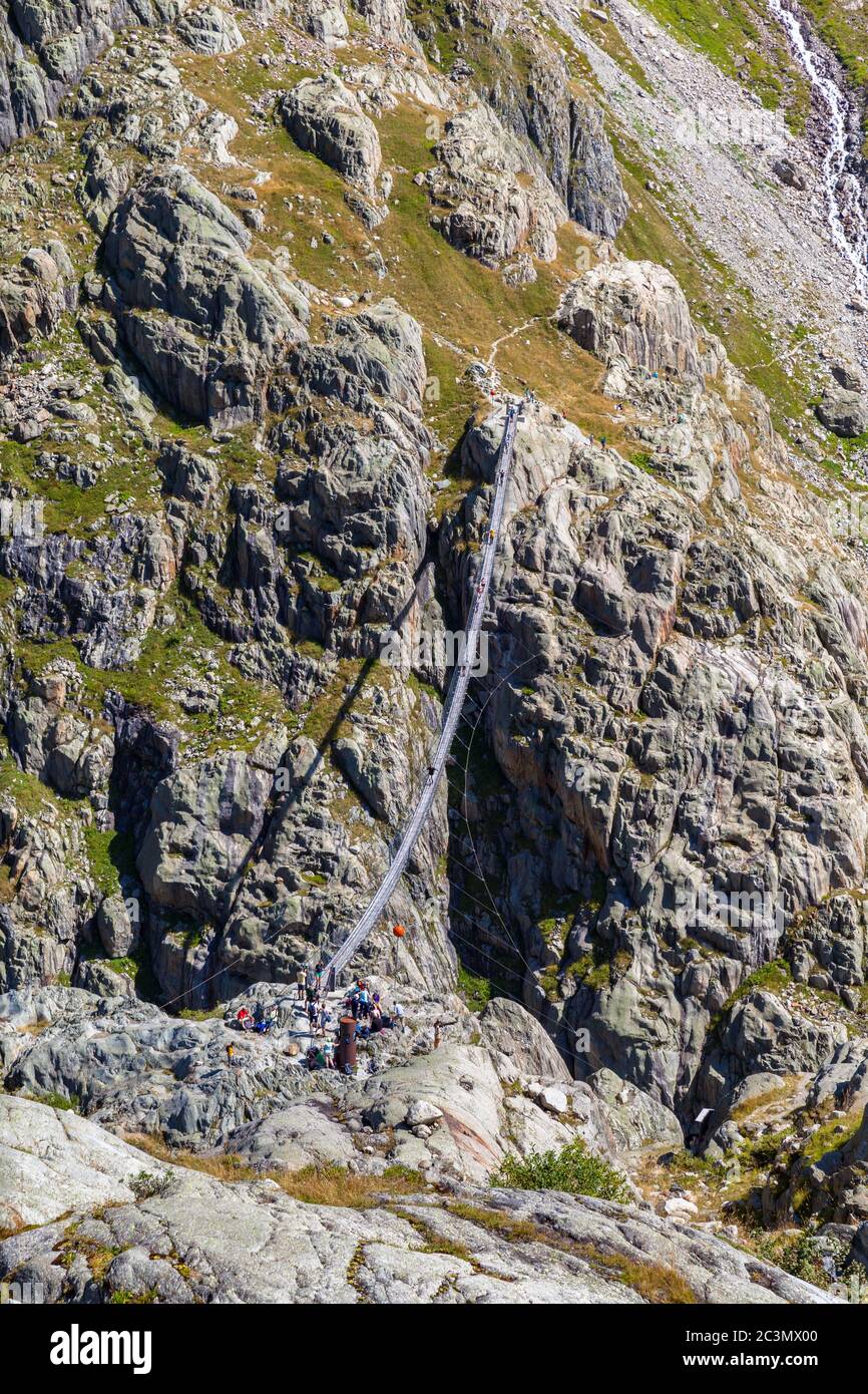 Aerial view of Trift bridge, a suspension bridge over the Triftsee ...