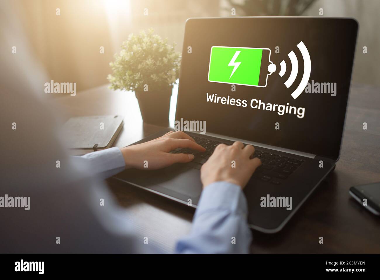 Wireless charging icons and progress bar on device screen Stock Photo ...