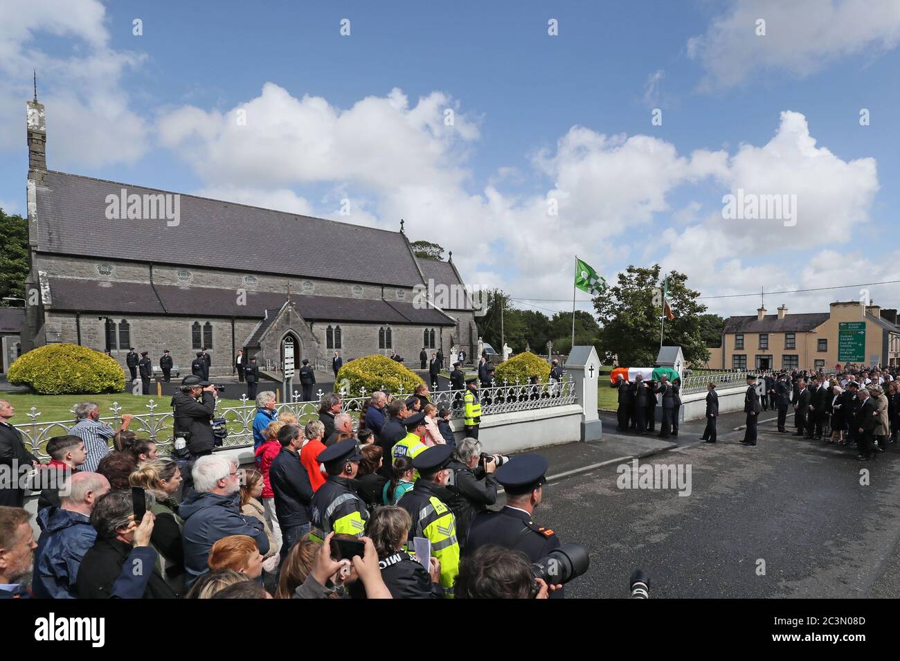 The coffin of Detective Garda Colm Horkan is carried into St James ...
