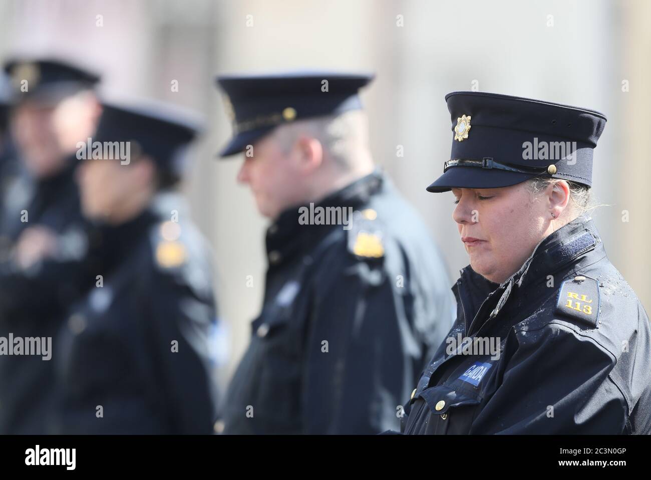 Garda line the streets for the funeral of Detective Garda Colm Horkan ...