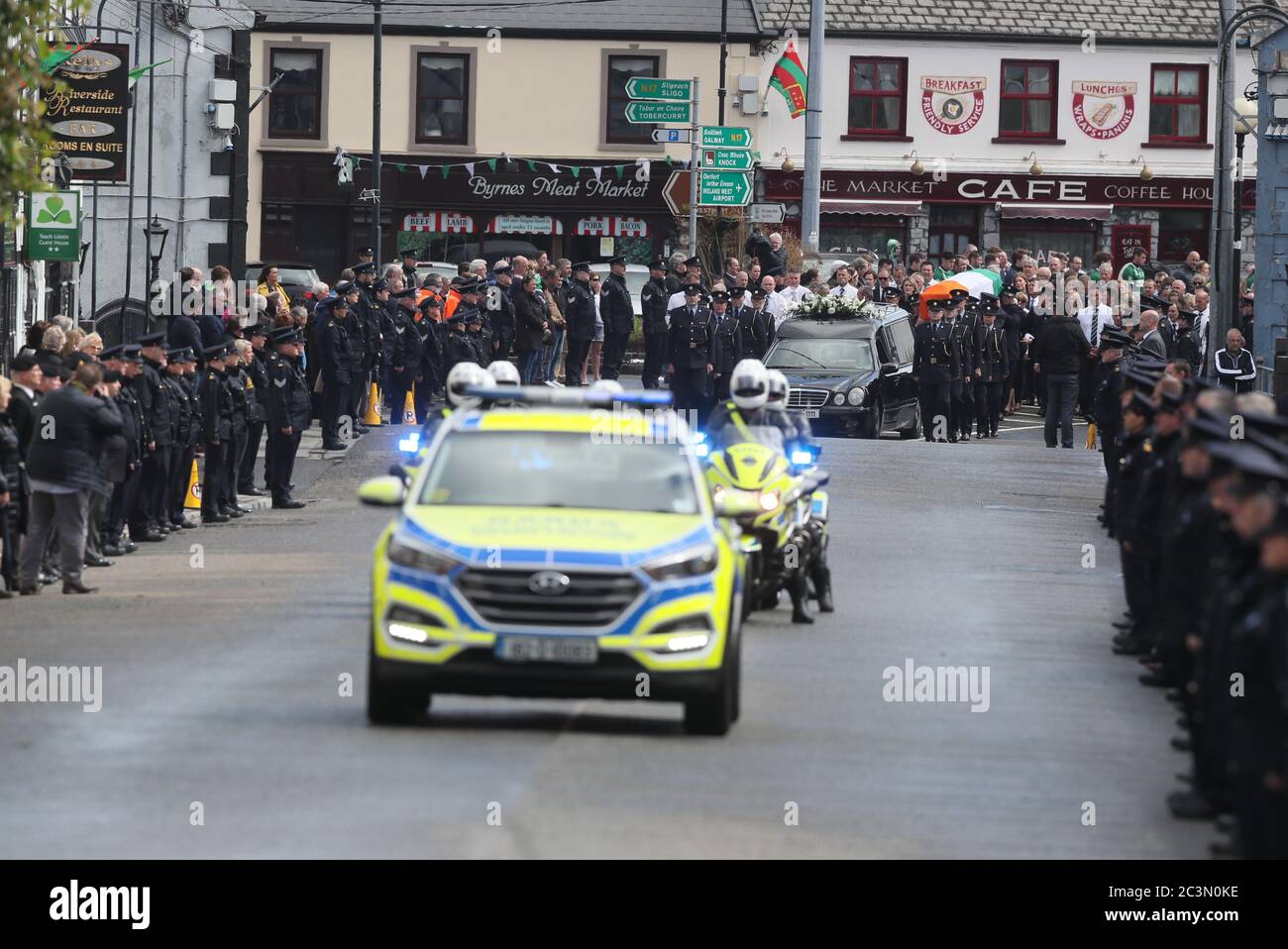 The coffin of Detective Garda Colm Horkan is carried to St James ...