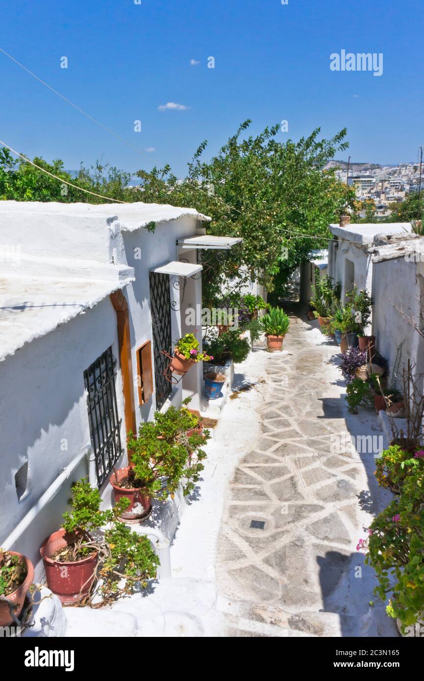 Plaka Anafiotika, Old city street view with small white houses, Athens ...