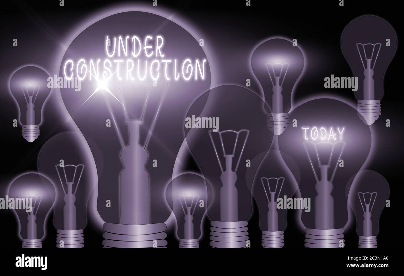 Writing note showing Under Construction. Business concept for building ...