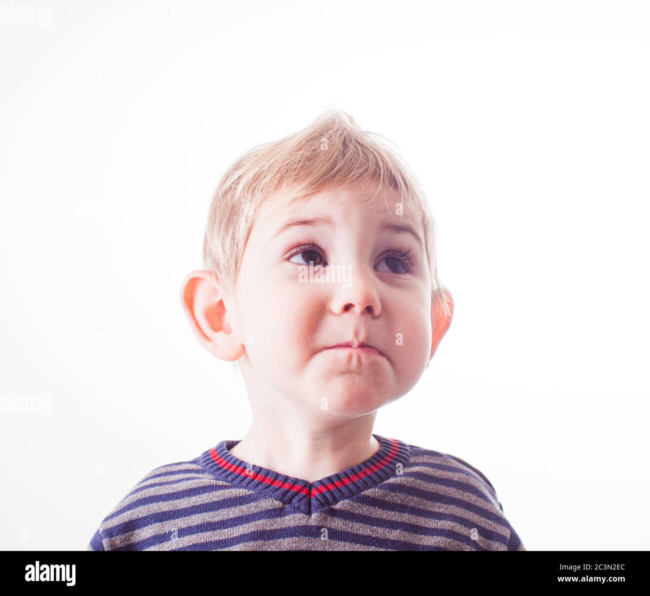 Closeup portrait of a surprised baby boy Stock Photo - Alamy