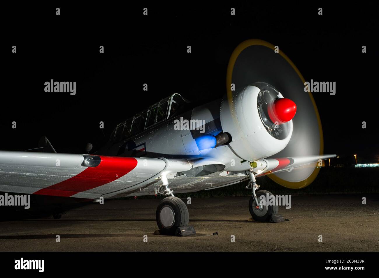 Aircraft with its propeller spinning fast at night Stock Photo - Alamy