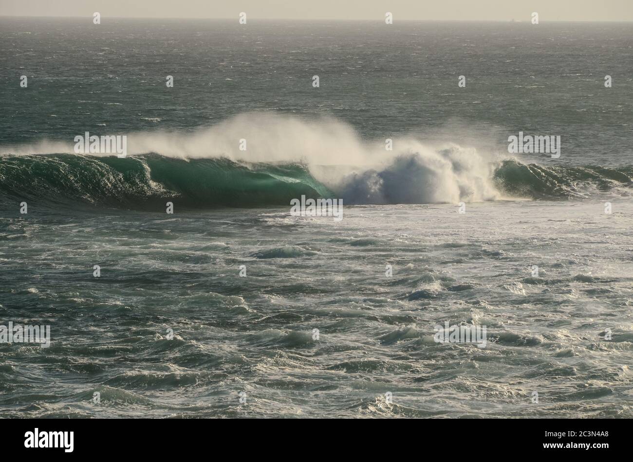 Big Blue Wave Breaks in the Atlantic Ocean Stock Photo - Alamy