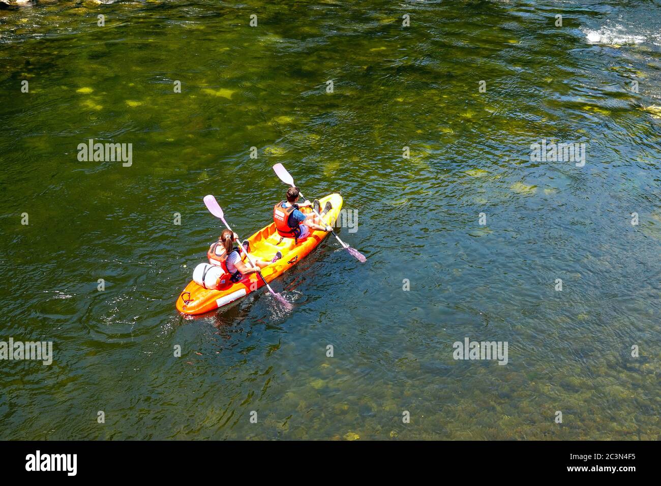 Canoeists, canoeing on the Ariege River, Ariege, French Pyrenees ...