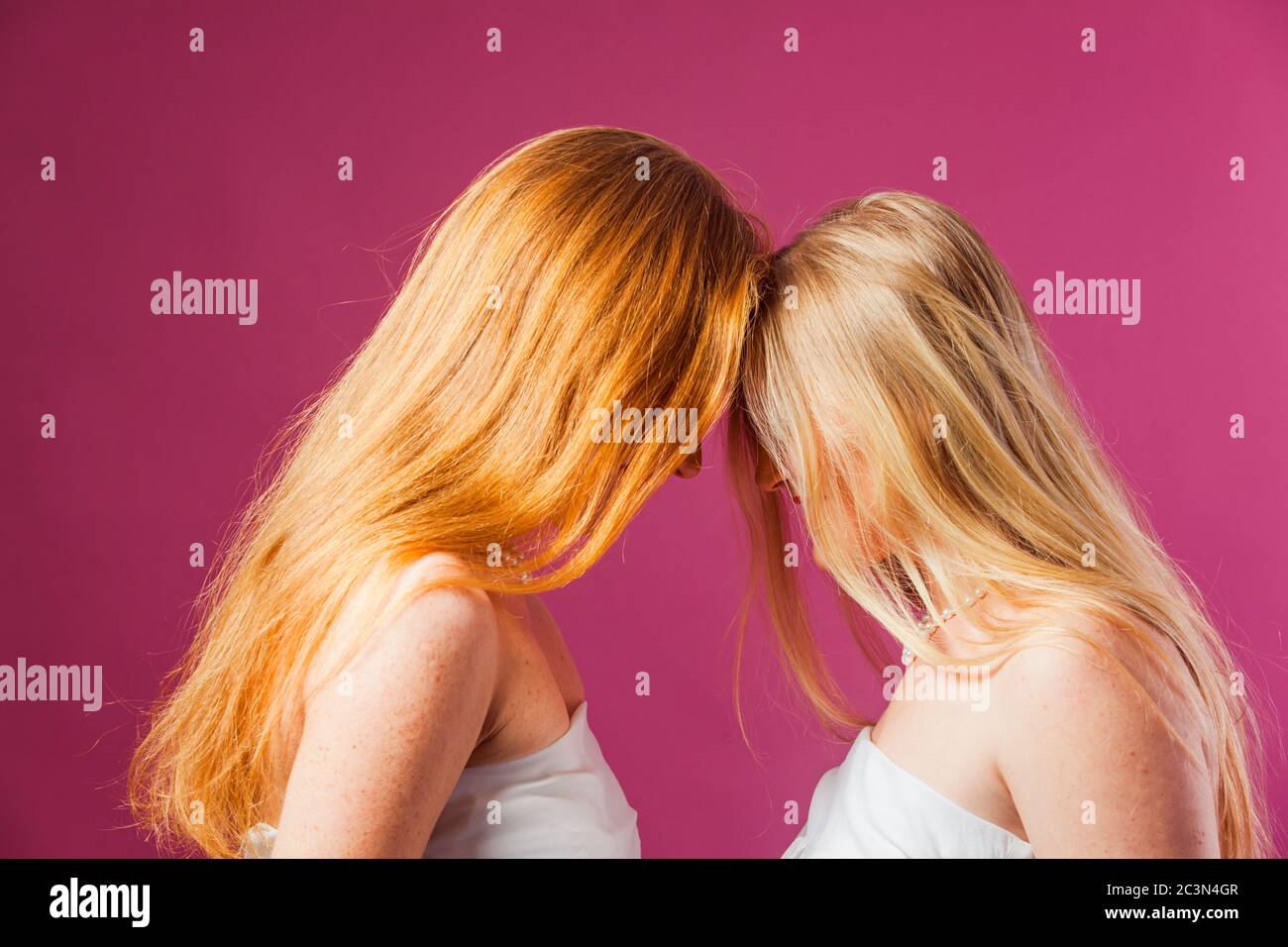 Two women touching each other hi-res stock photography and images - Alamy