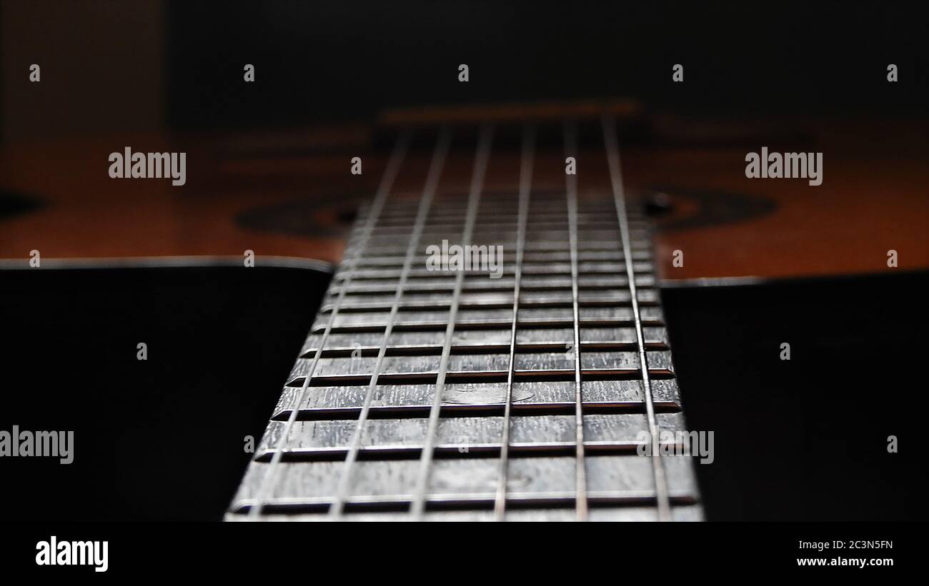 Closeup shot of the strings of a standard acoustic guitar Stock Photo ...