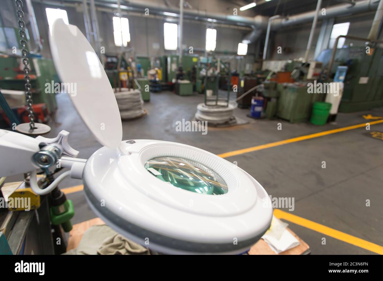 Detail of industrial machinery inside a production line facility plant ...