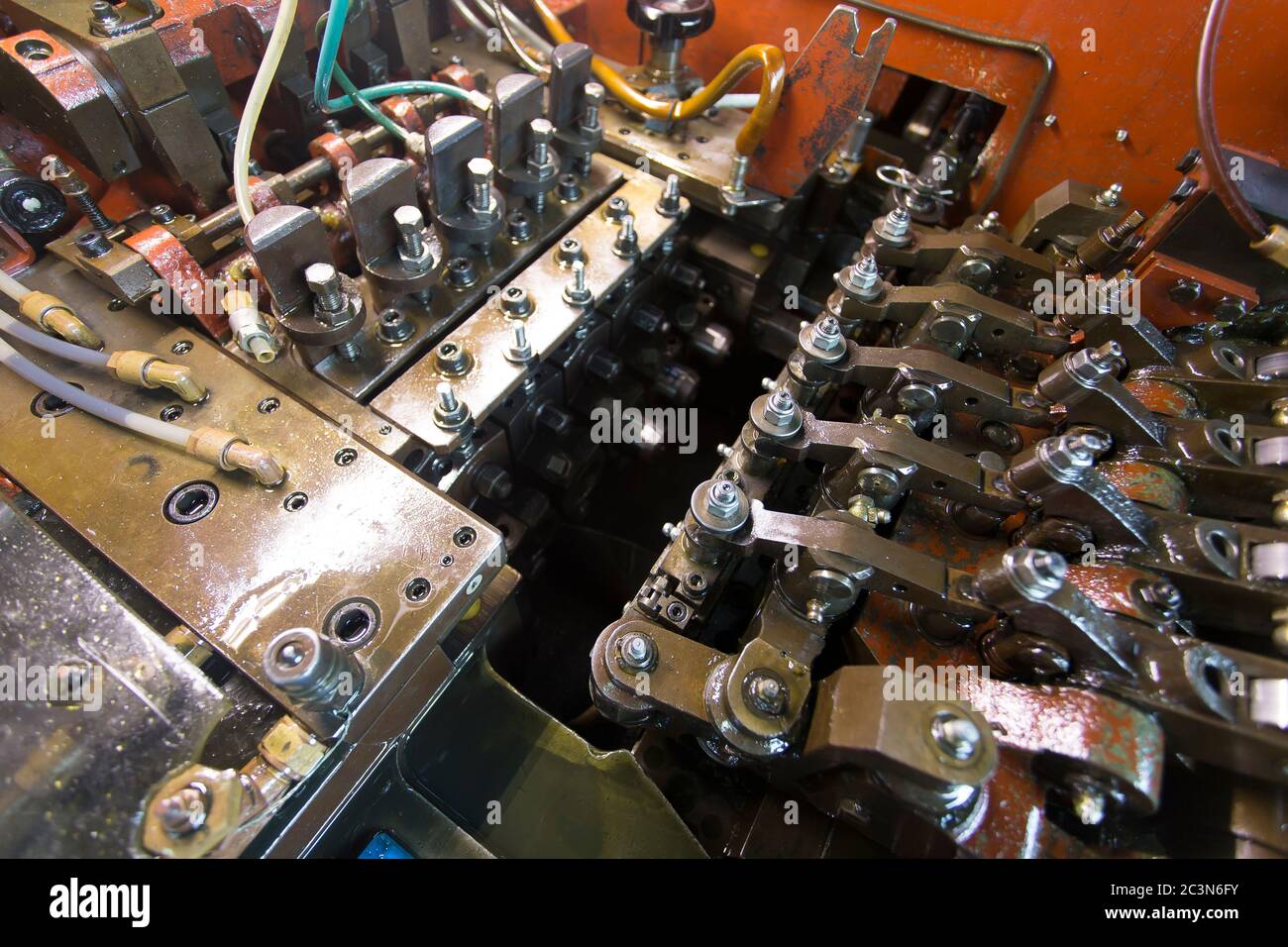 Detail of industrial machinery inside a production line facility plant ...