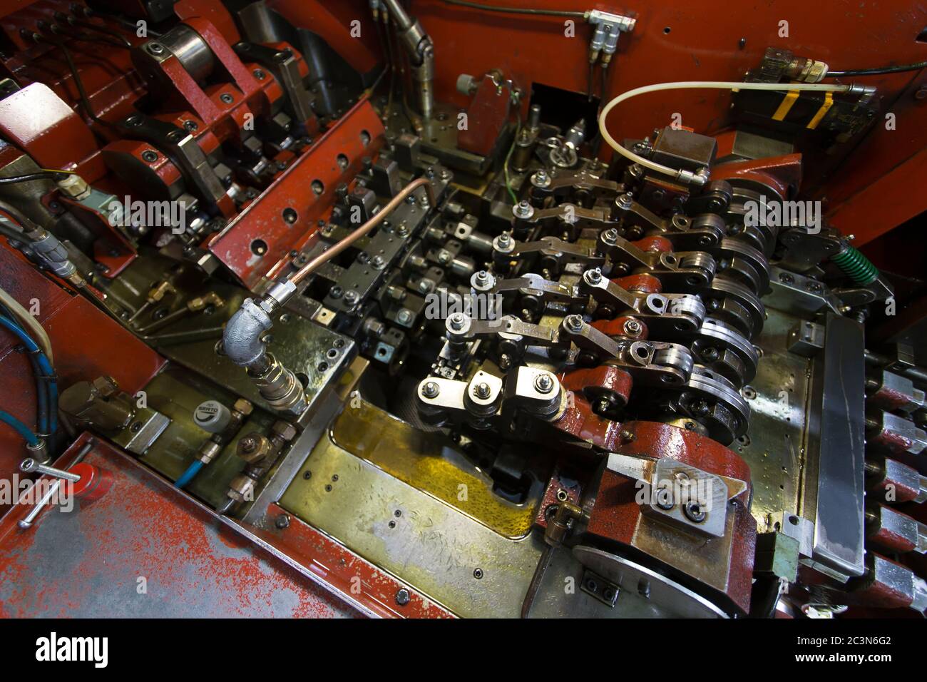 Detail of industrial machinery inside a production line facility plant ...