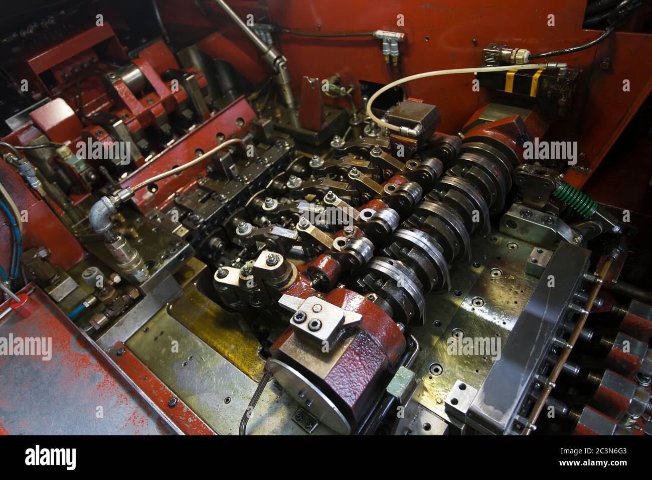 Detail of industrial machinery inside a production line facility plant ...