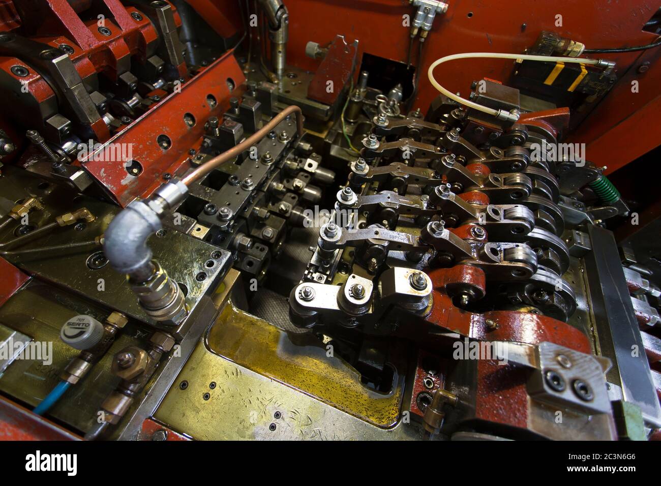 Detail of industrial machinery inside a production line facility plant ...