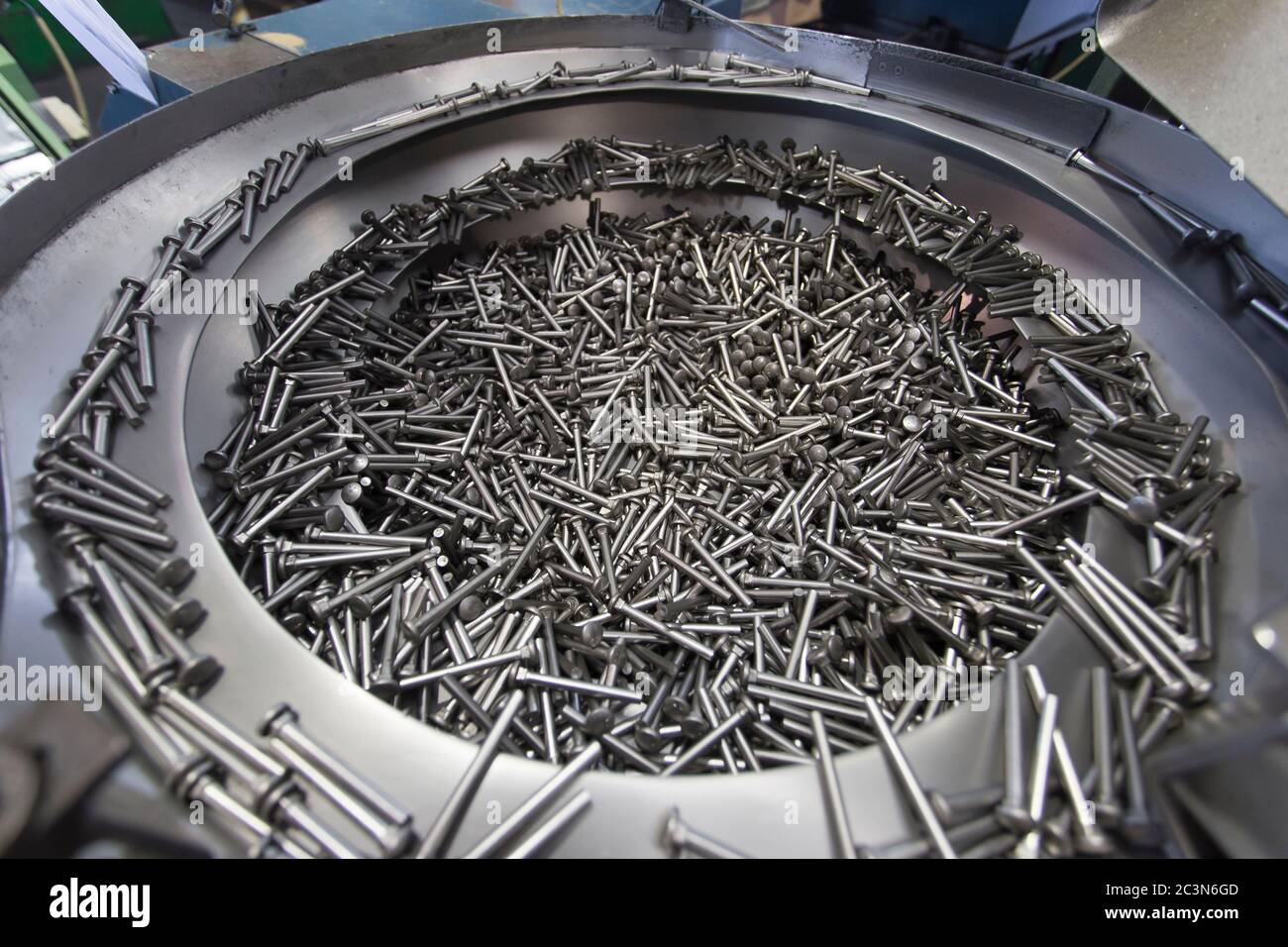 Detail of industrial machinery inside a production line facility plant ...