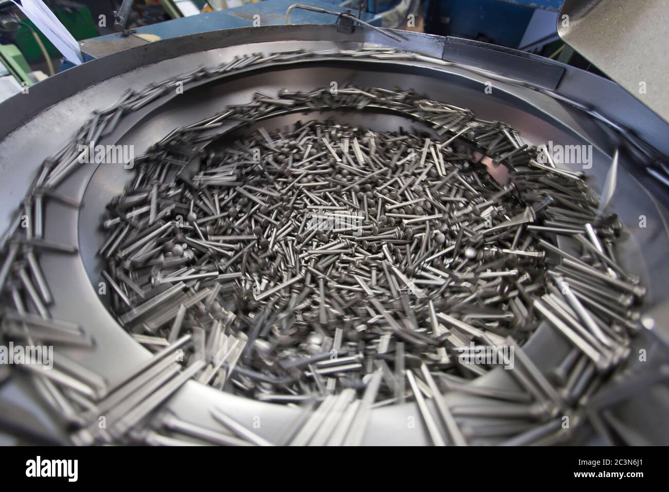 Detail of industrial machinery inside a production line facility plant ...